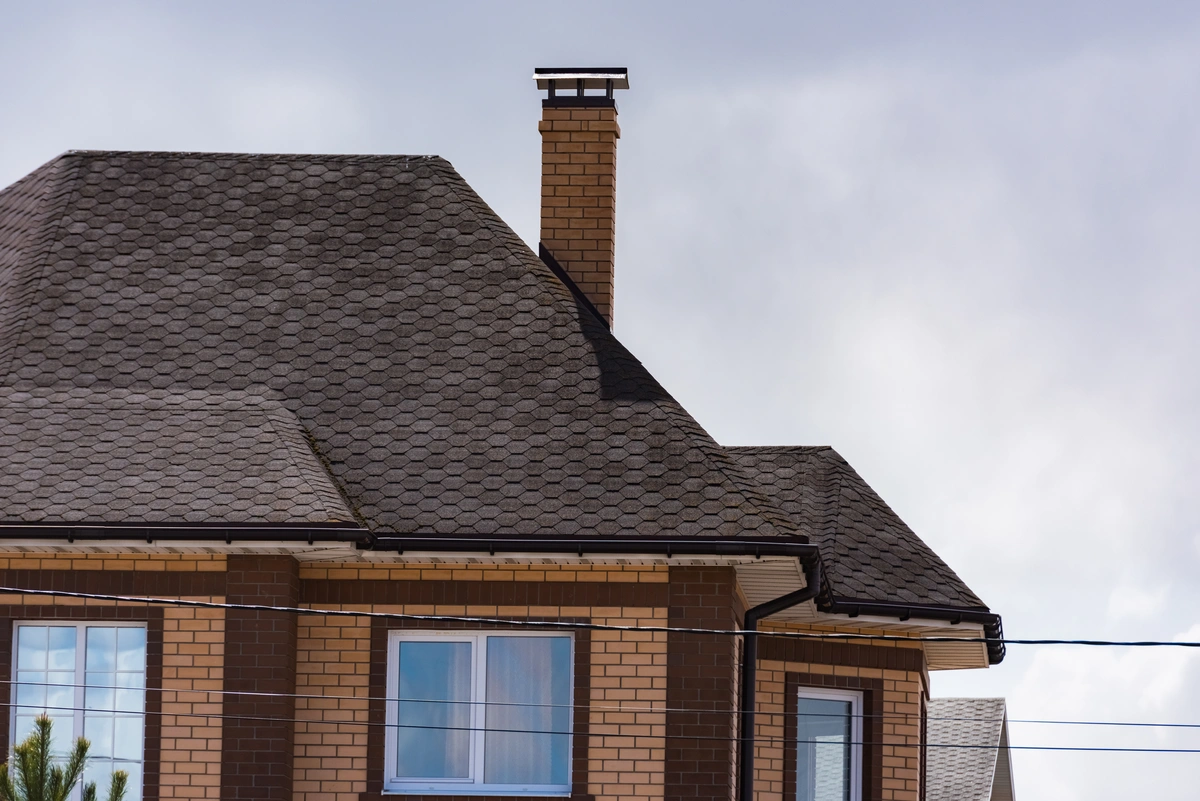How Long Do Roof Shingles Last? (Material Guide)